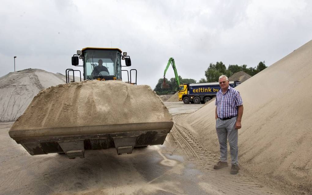 Zand van de Veluwemeerbodem naar de voortuin